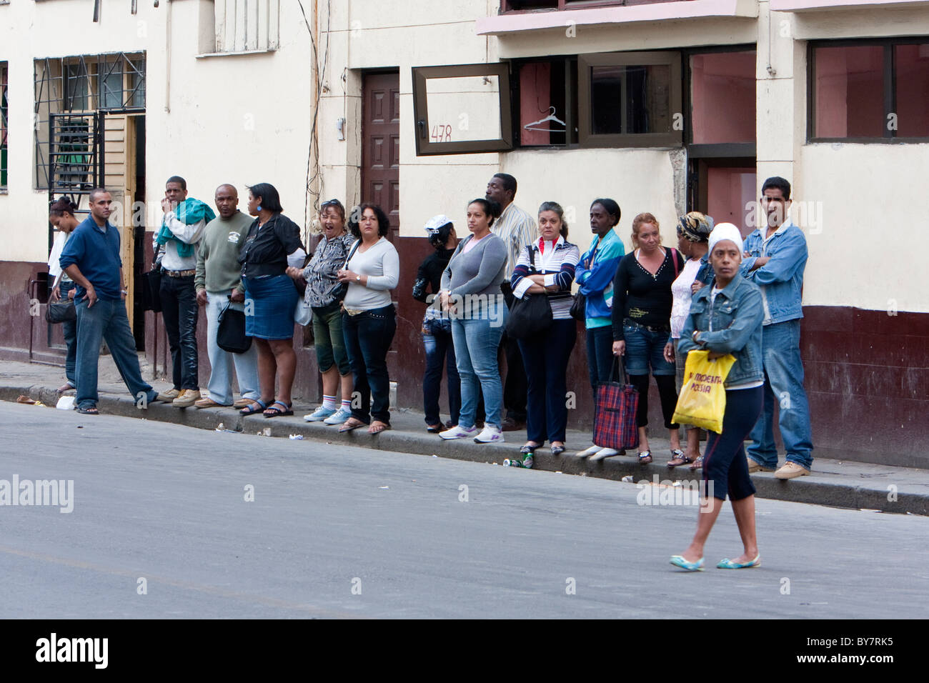 Crowd people waiting bus stop hi-res stock photography and images - Alamy