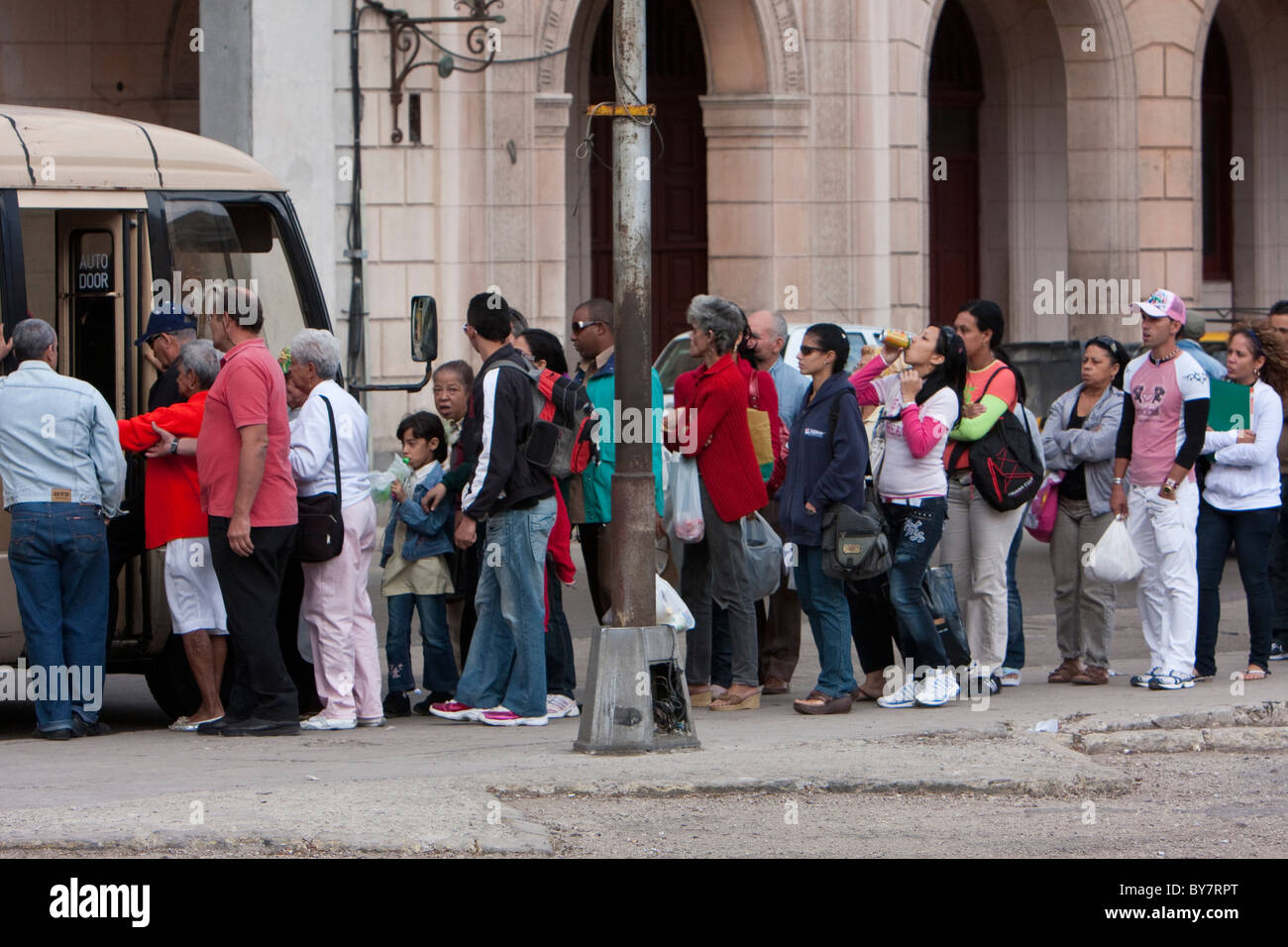 Group of people getting on bus hi-res stock photography and images - Alamy