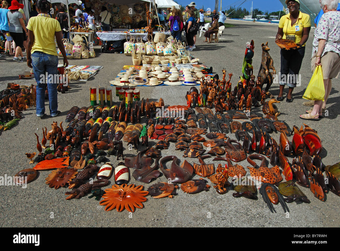 Carved wooden souvenirs for sale on the quayside, Montego Bay, Jamaica ...