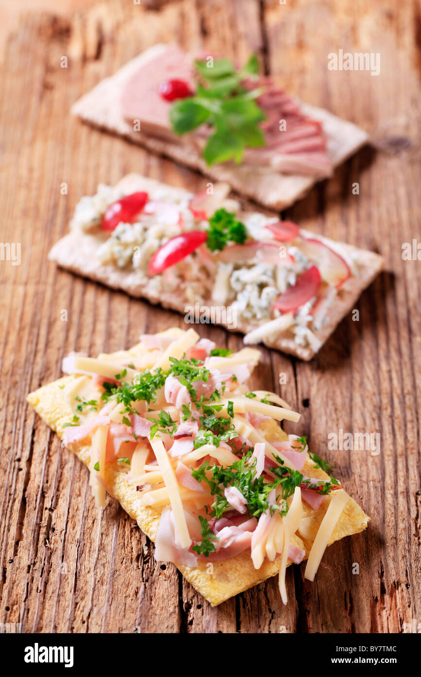 Three slices of crispbread with various toppings Stock Photo - Alamy