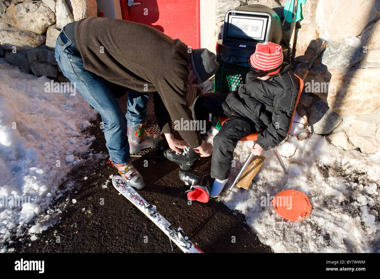 Boy removing boots hi-res stock photography and images - Alamy
