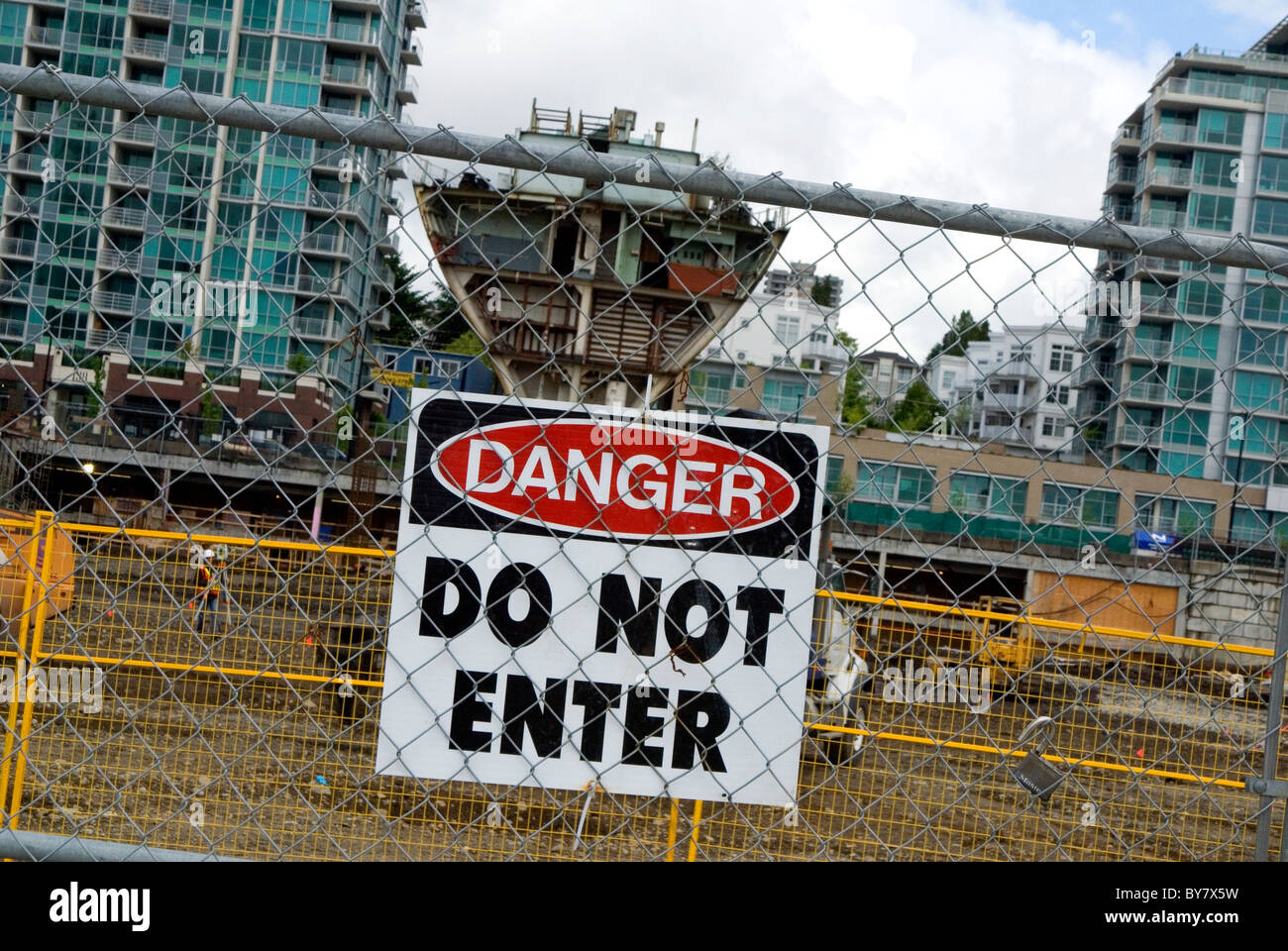 Danger Do Not Enter sign on a fence by a construction zone Stock Photo ...