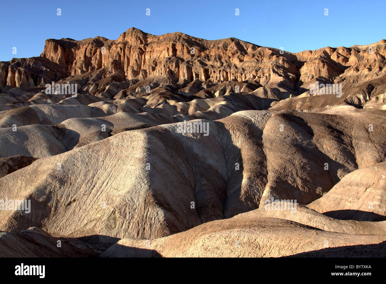 The eroded badlands of Zabriskie Point, in the Amargosa Range near ...