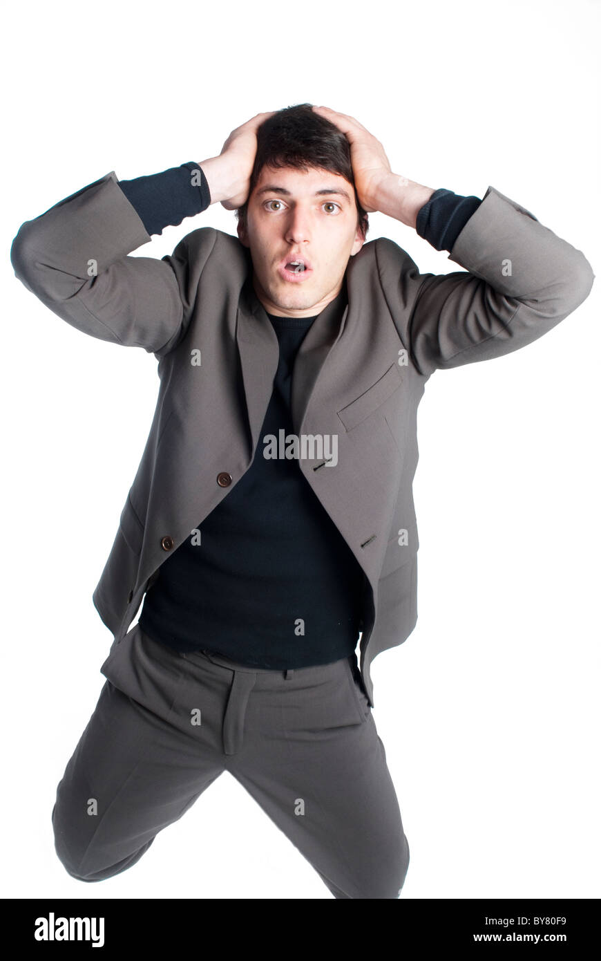 Frustrated man in studio Cut Out Stock Images & Pictures - Alamy