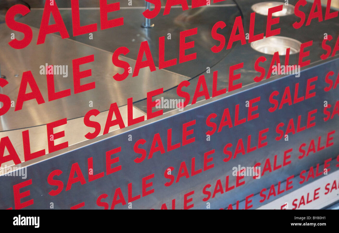 Sale Sign in retail shop window in London Stock Photo - Alamy