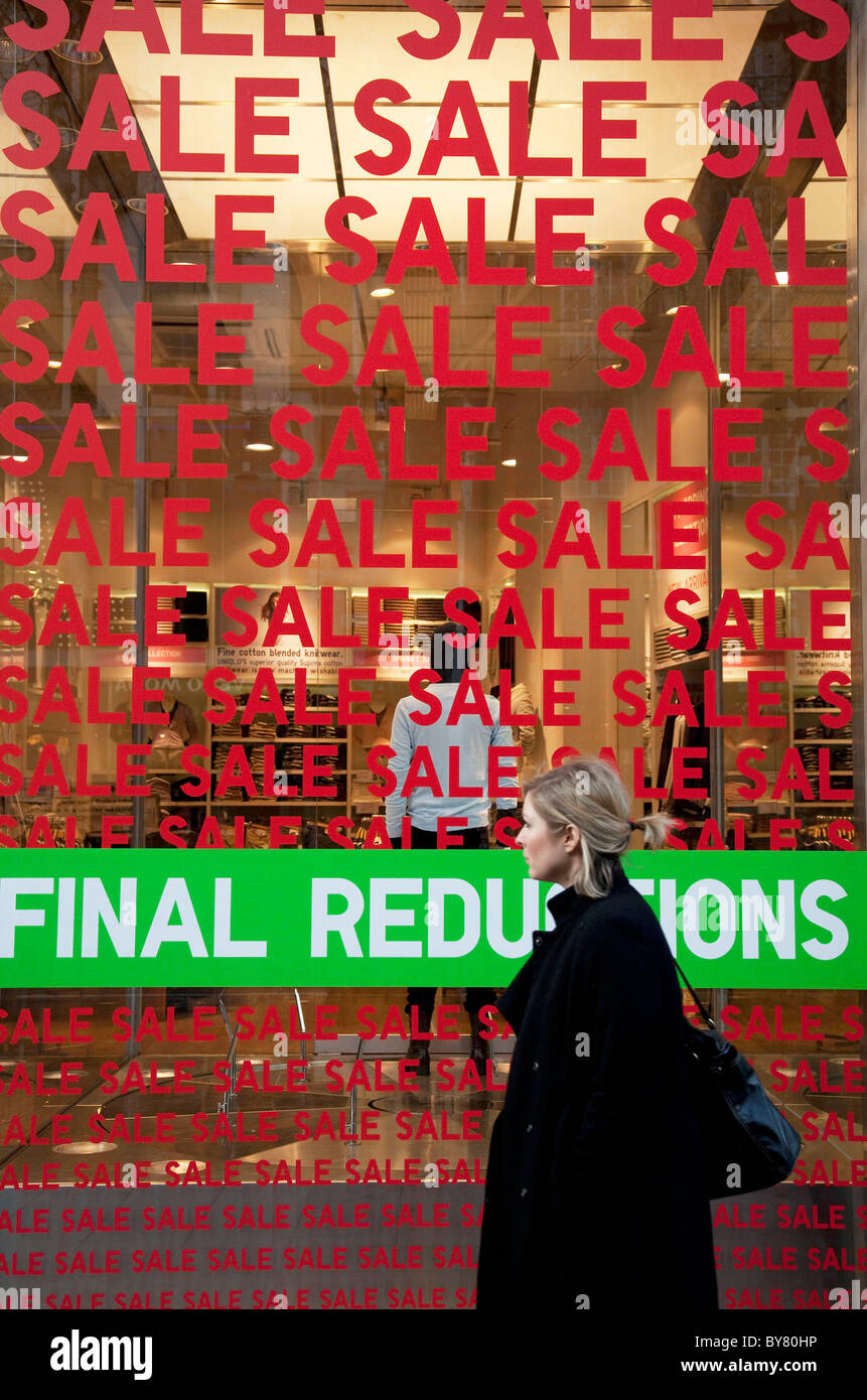 Sale Sign in retail shop window in London Stock Photo - Alamy