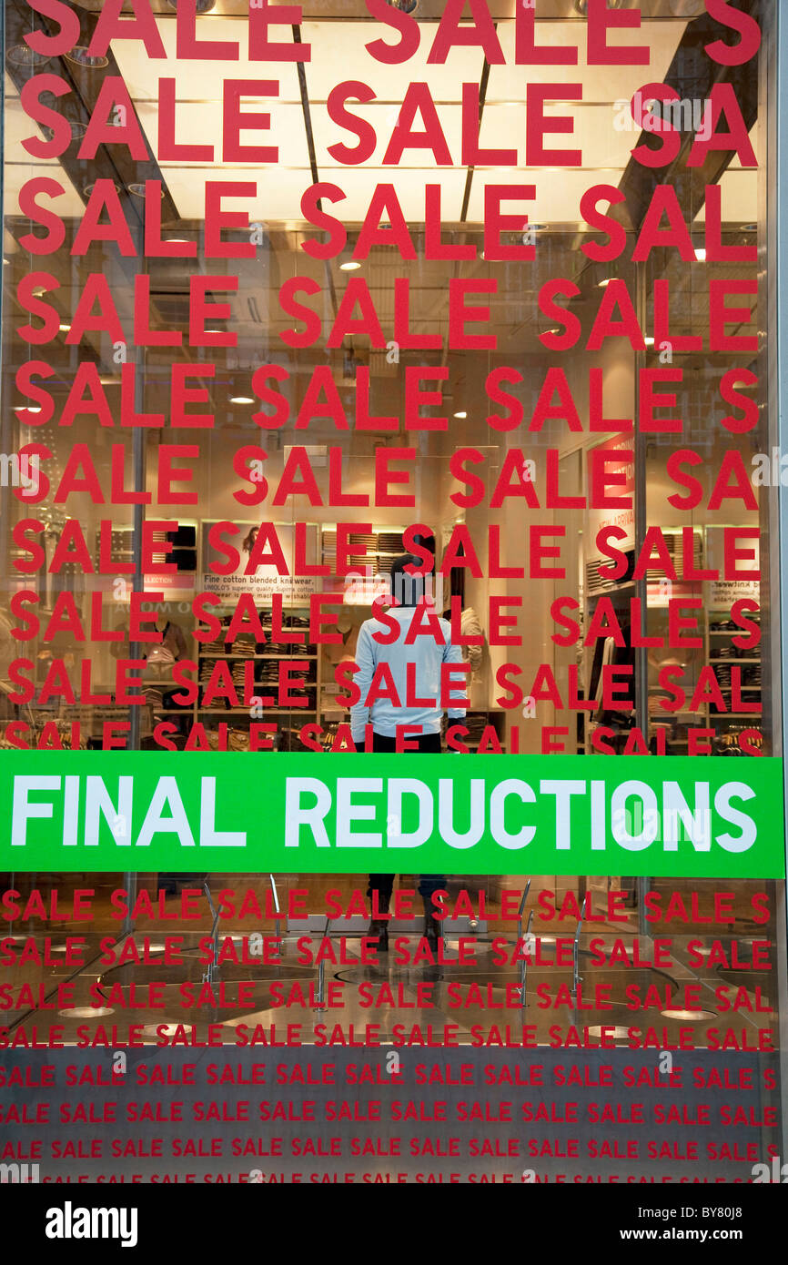 Sale Sign in retail shop window in London Stock Photo - Alamy