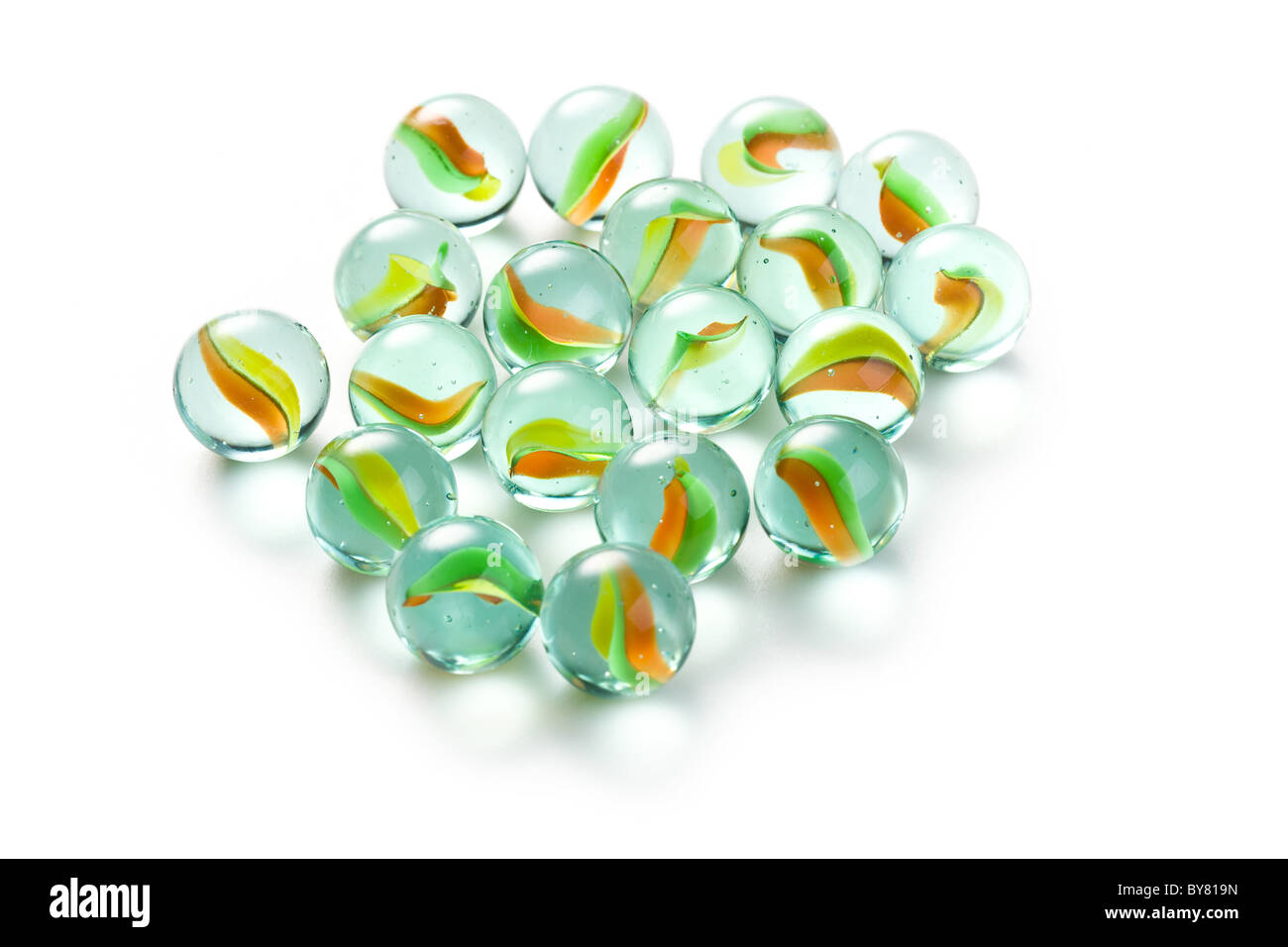 colorful glass marbles on white background Stock Photo - Alamy