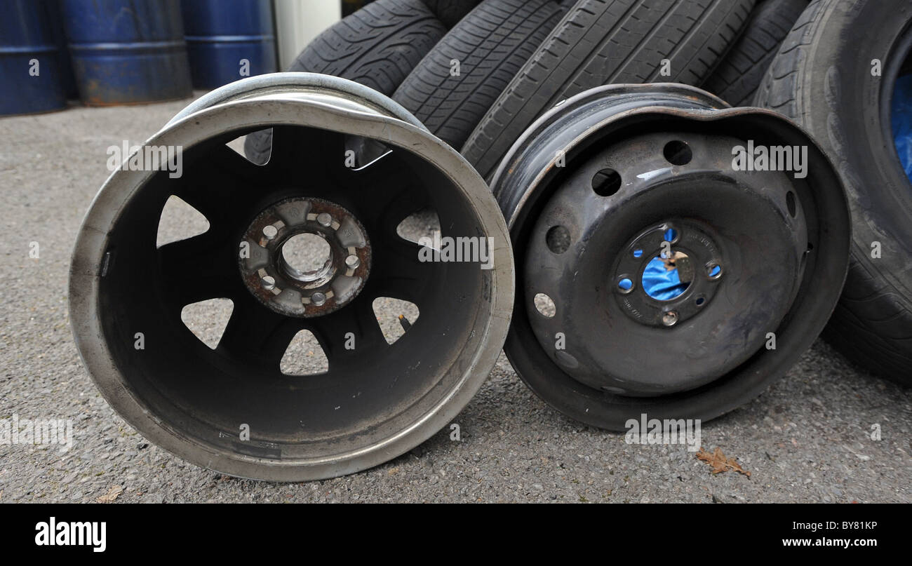 Pothole damaged tyre rims Stock Photo - Alamy