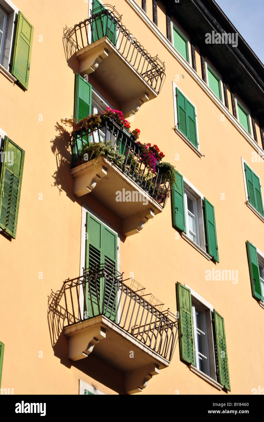 Tyrolean style house with windows and decorations Stock Photo - Alamy