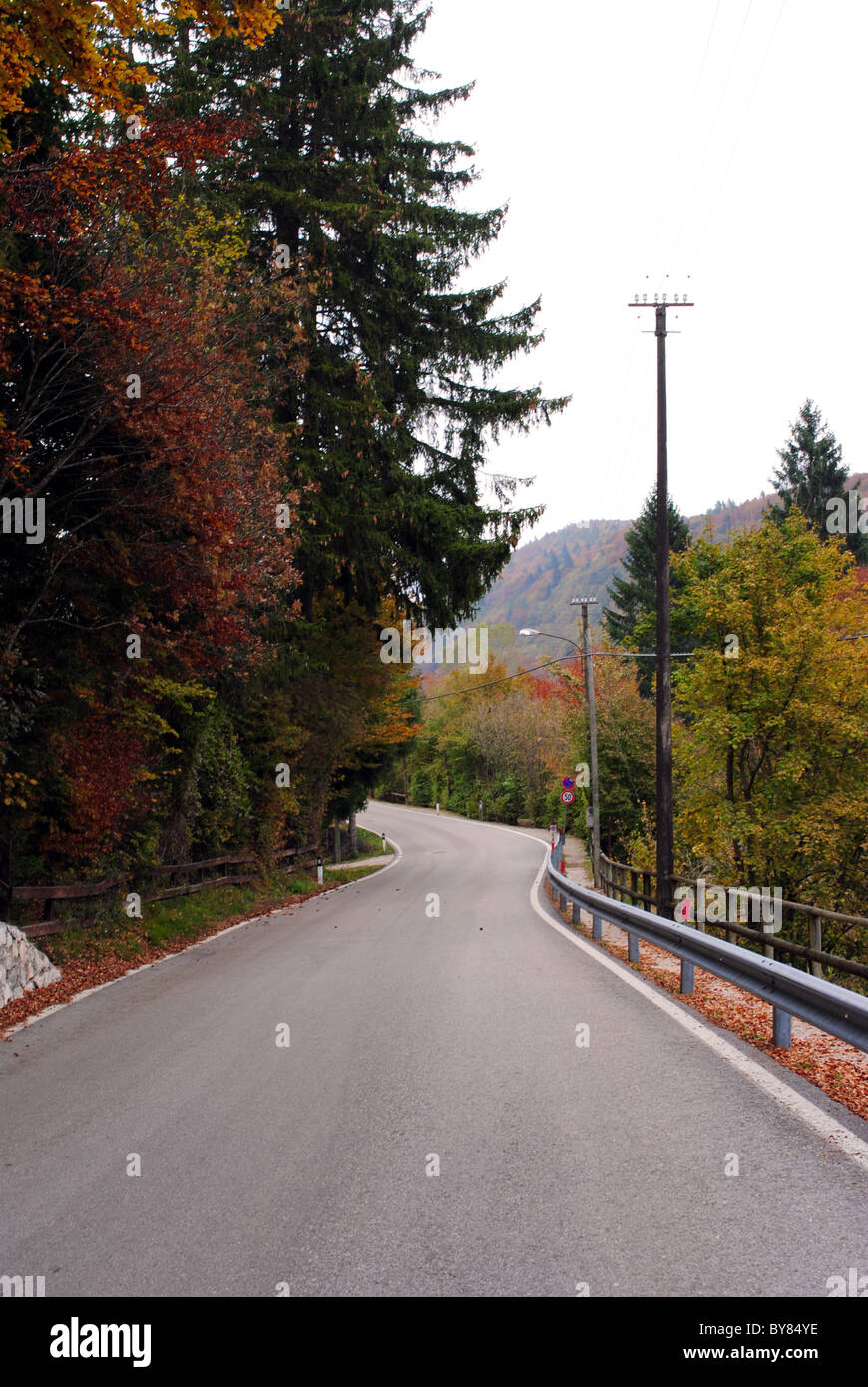 paved road with left turn Stock Photo - Alamy