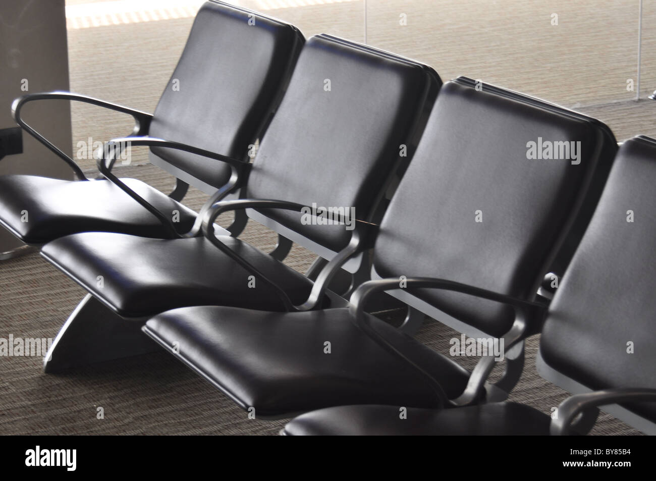 Comfortable seats in a waiting lounge Stock Photo - Alamy
