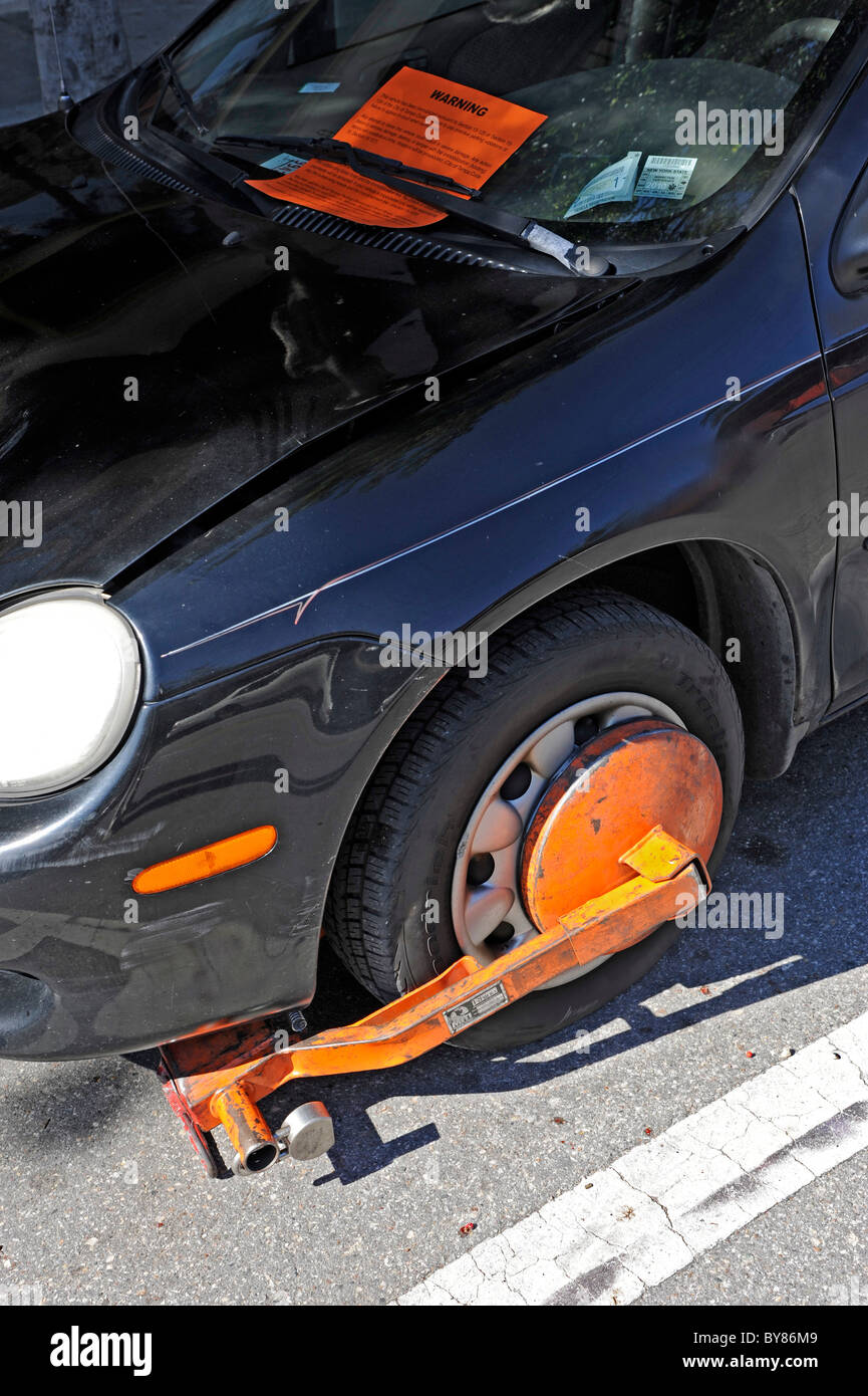 Parking restraint known as the boot or Denver boot is to prevent a car ...