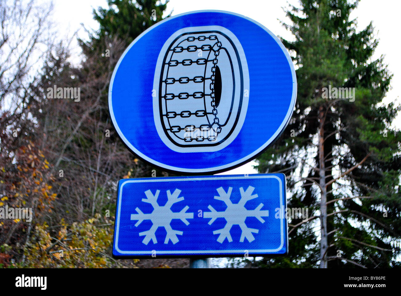 blue road sign danger of snow Stock Photo - Alamy