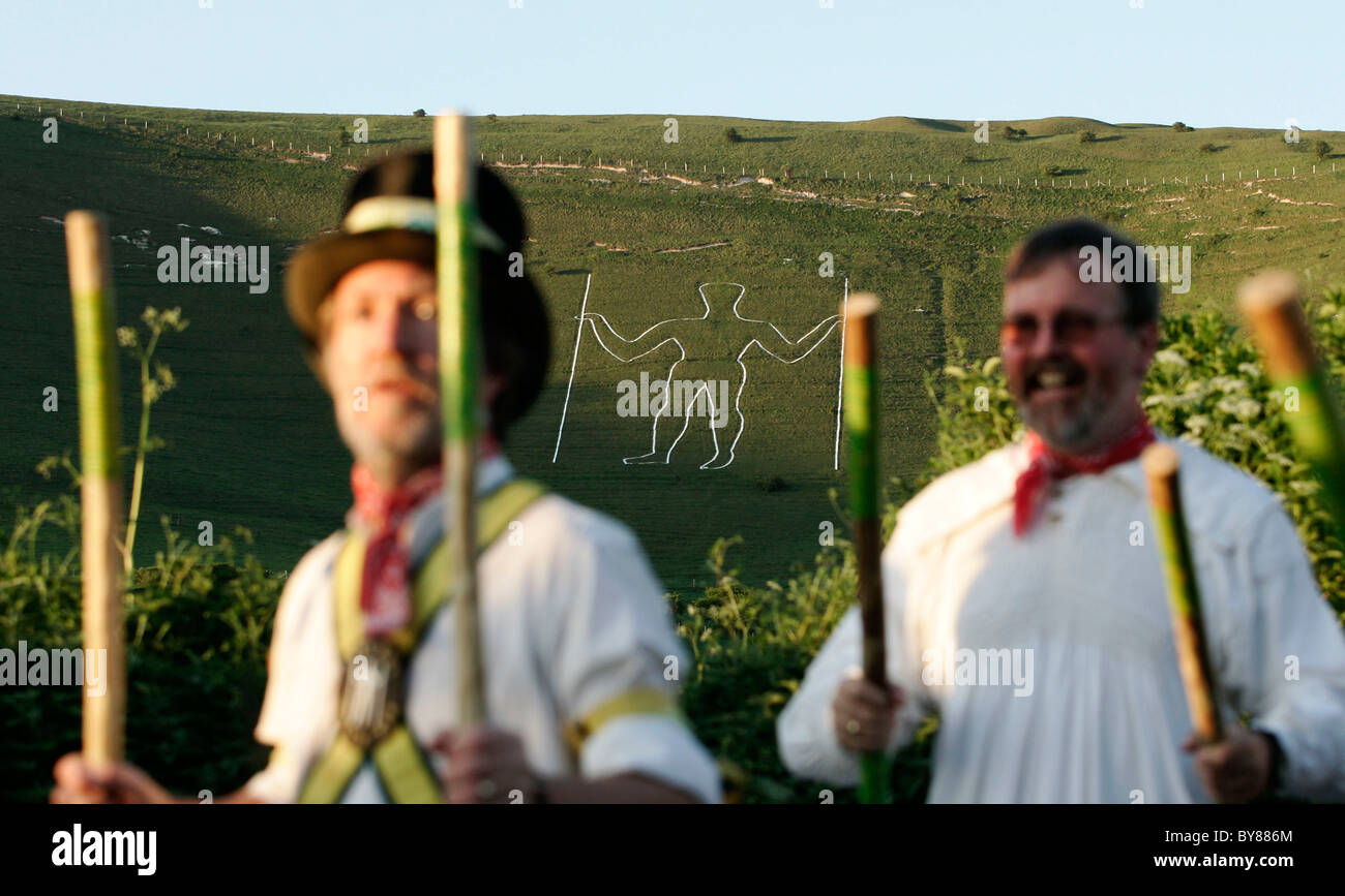 Long Man Morris Men dance at the foot of the Long Man of Wilmington as ...