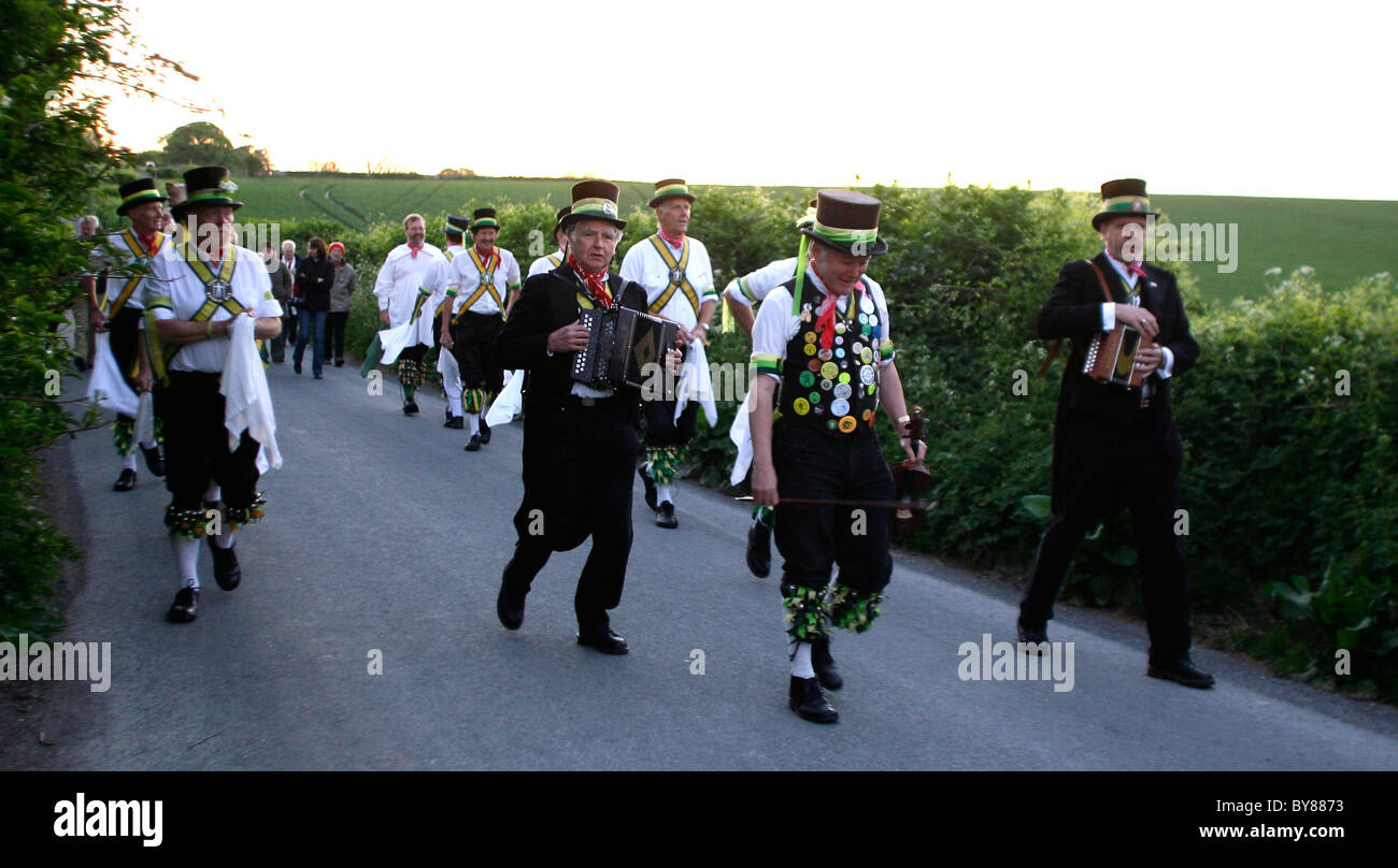 Long Man Morris Men dance at the foot of the Long Man of Wilmington as ...