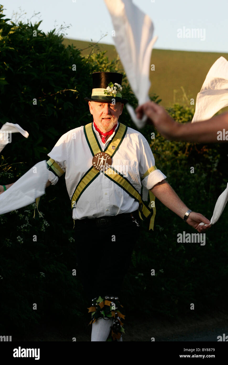 Long Man Morris Men dance at the foot of the Long Man of Wilmington as ...