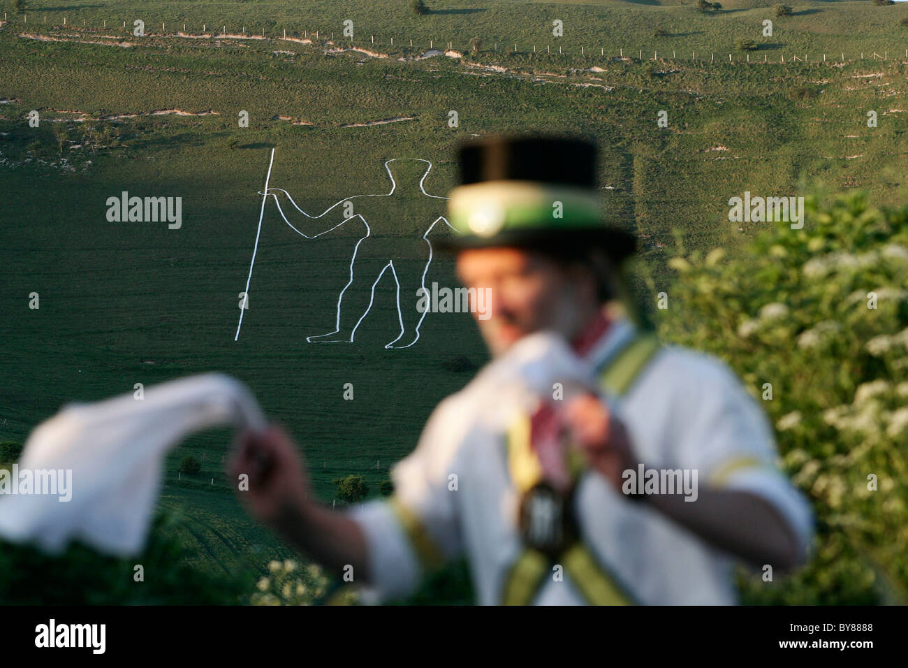 Long Man Morris Men dance at the foot of the Long Man of Wilmington as ...