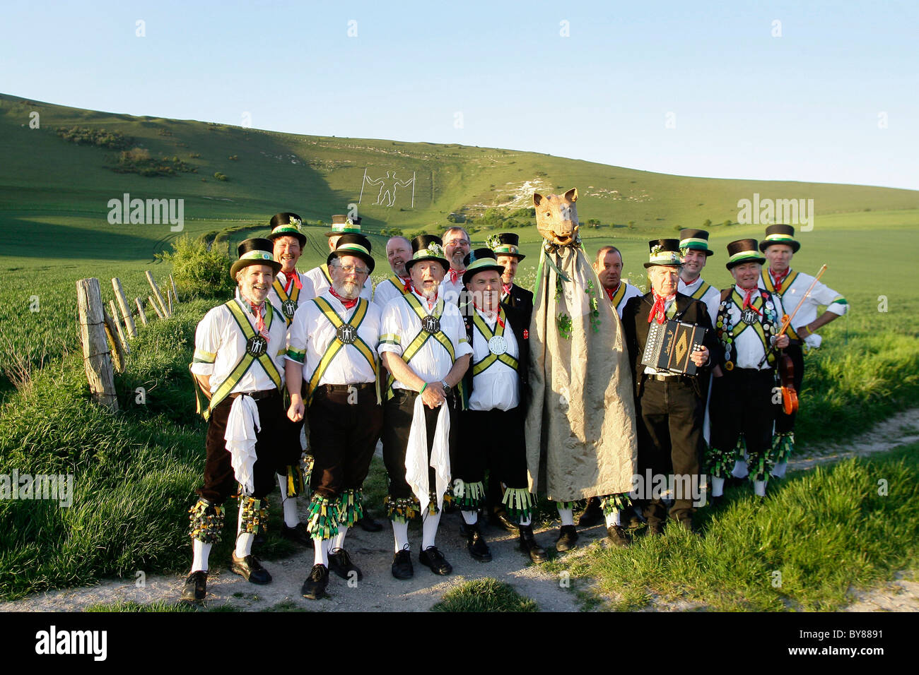 Long Man Morris Men dance at the foot of the Long Man of Wilmington as ...