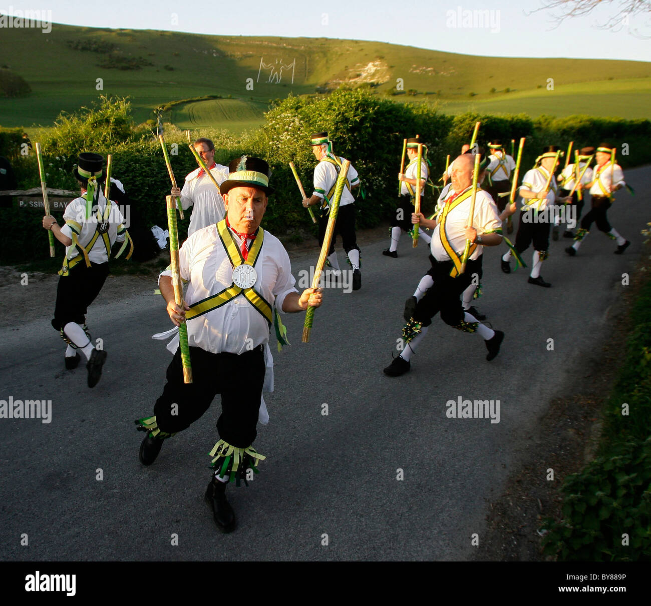 Long Man Morris Men dance at the foot of the Long Man of Wilmington as ...