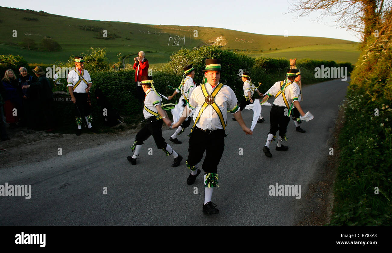 Long Man Morris Men dance at the foot of the Long Man of Wilmington as ...