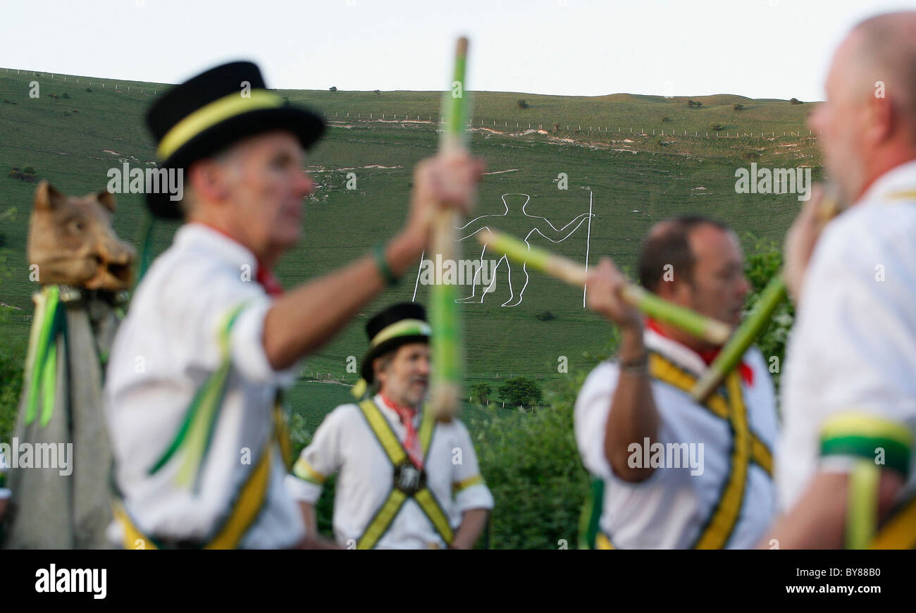 Long Man Morris Men dance at the foot of the Long Man of Wilmington as ...