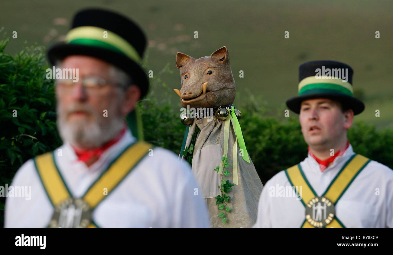 Long Man Morris Men dance at the foot of the Long Man of Wilmington as ...