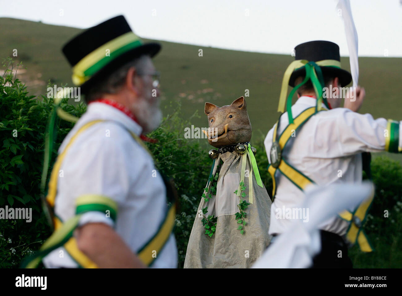 Long Man Morris Men dance at the foot of the Long Man of Wilmington as ...