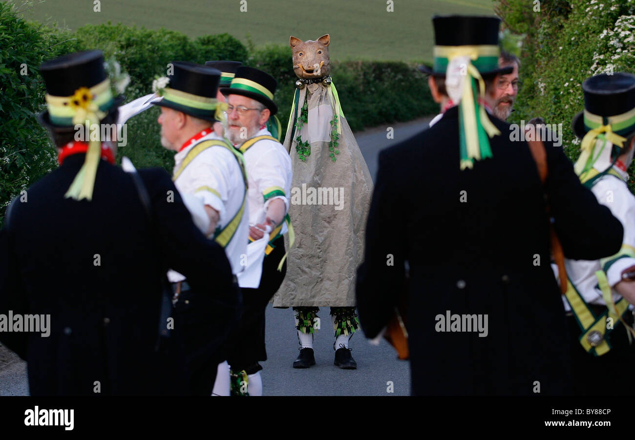 Long Man Morris Men dance at the foot of the Long Man of Wilmington as ...