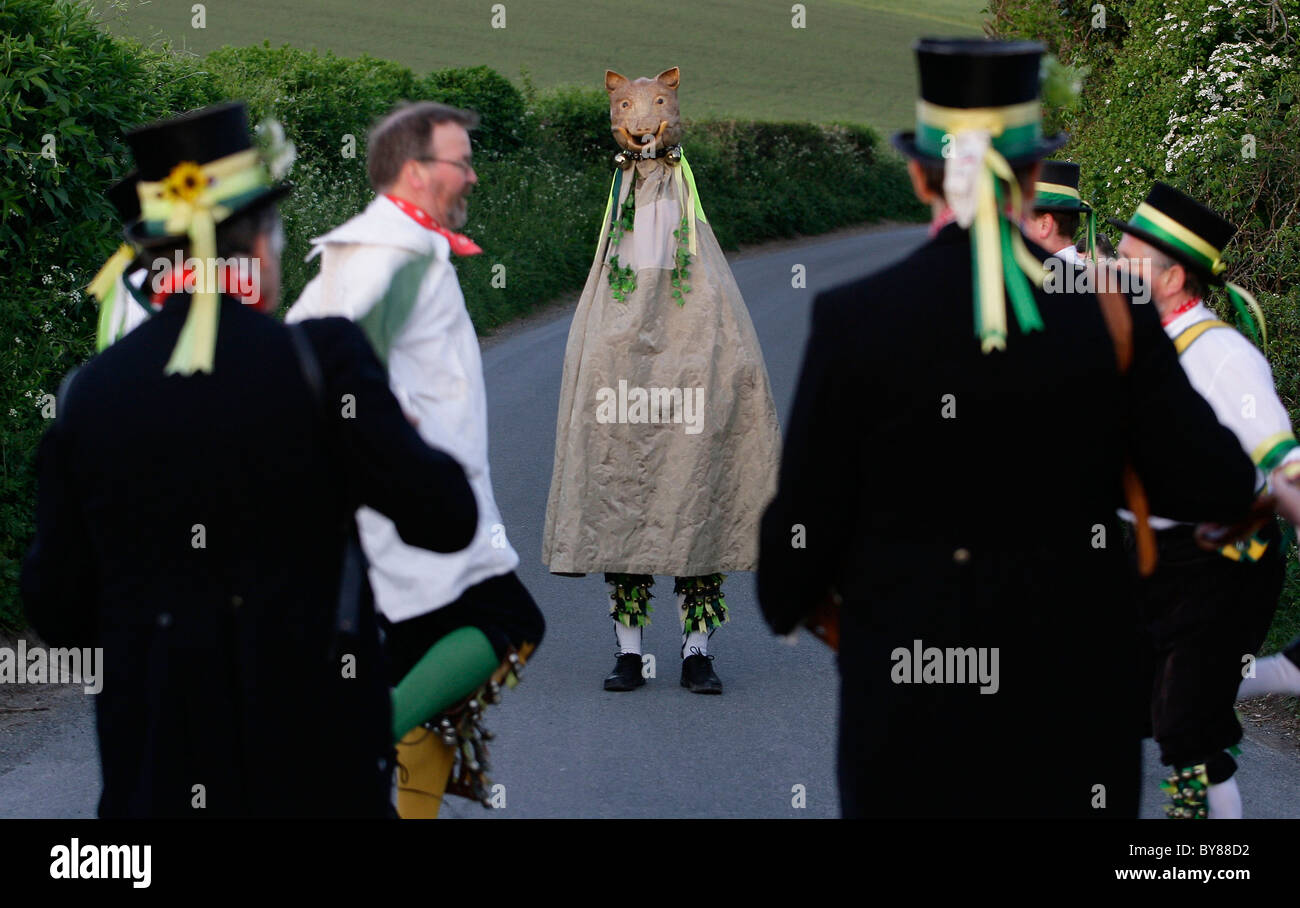 Long Man Morris Men dance at the foot of the Long Man of Wilmington as ...