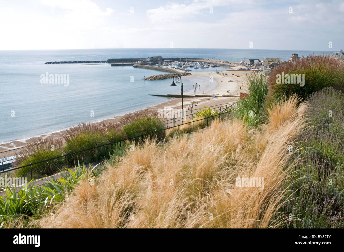 View across Langmoor Gardens towards the beach and harbour area at Lyme ...