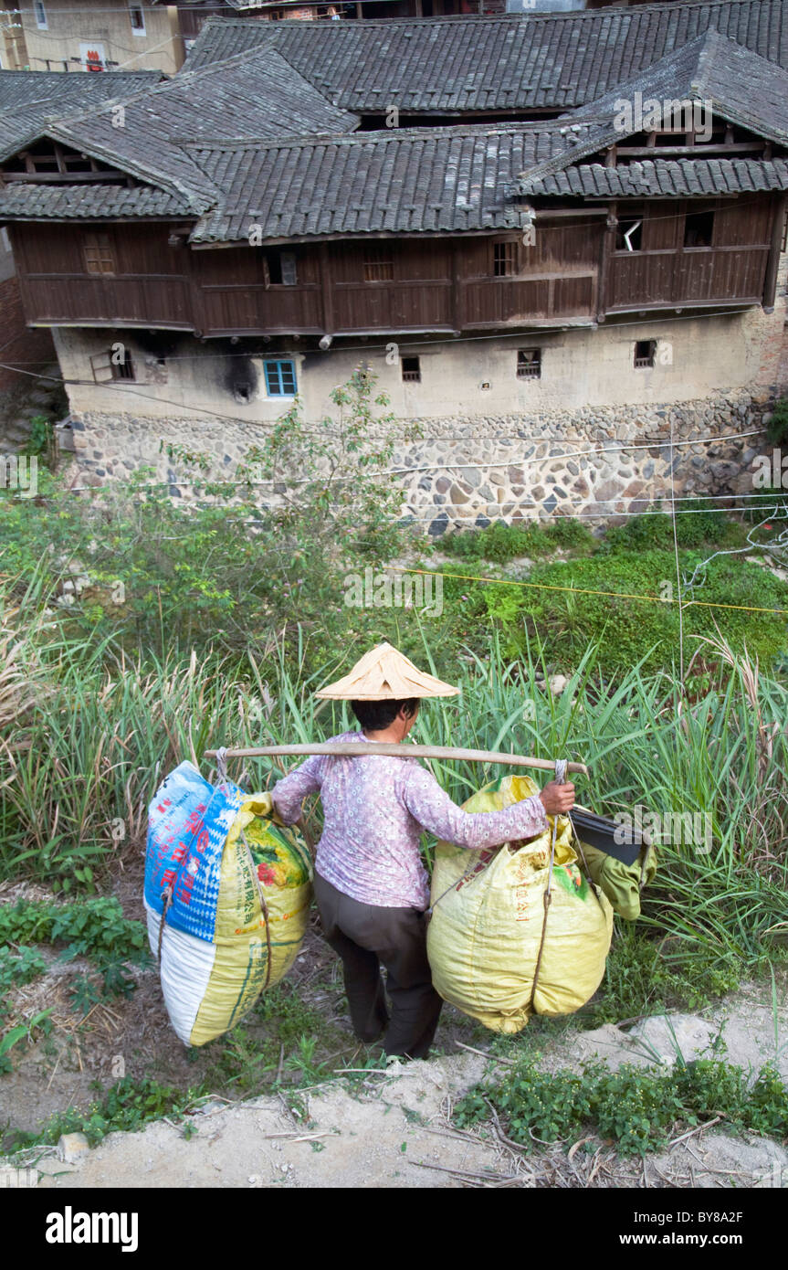 Woman carrying tea cups hi-res stock photography and images - Alamy