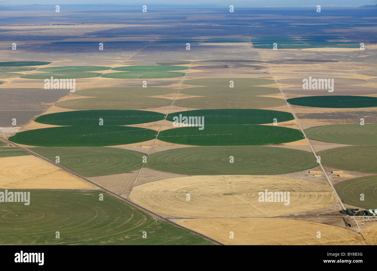 An aerial view of the crop circles created in farm fields by center ...