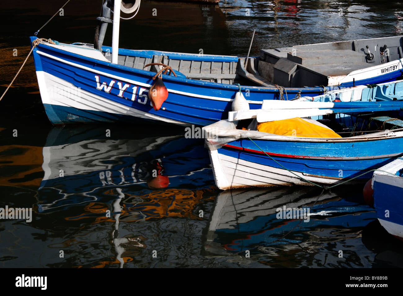 Fishing boats in Whitby harbour North Yorkshire, England Stock Photo ...