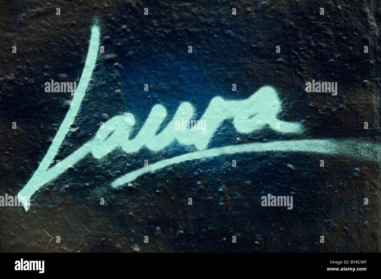 laura written on wall Stock Photo - Alamy