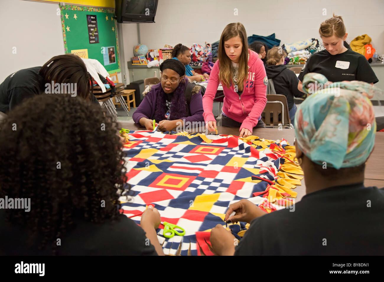 Volunteers Make Blankets for the Homeless Stock Photo - Alamy