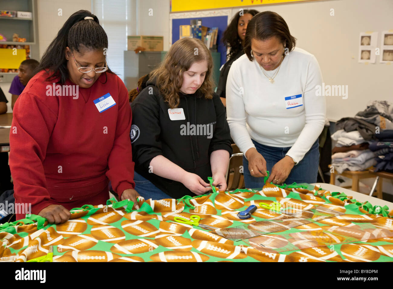 Volunteers Make Blankets for the Homeless Stock Photo - Alamy