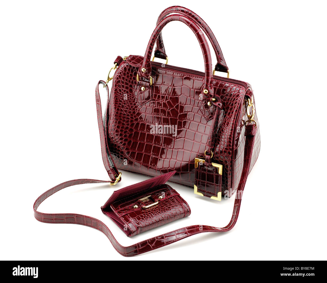 maroon imitation leather handbag and matching purse Stock Photo - Alamy