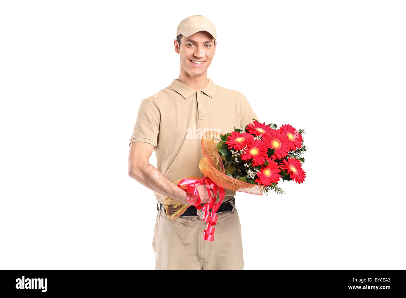 A delivery man delivering a bunch of flowers Stock Photo - Alamy