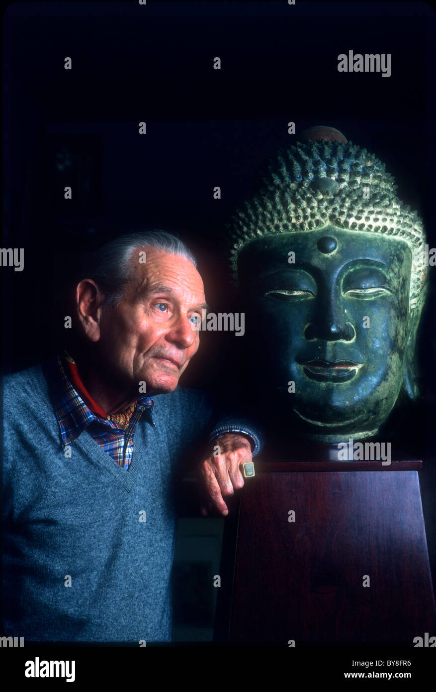 Dr Paul Singer with Chinese artifact Buddha head Stock Photo - Alamy