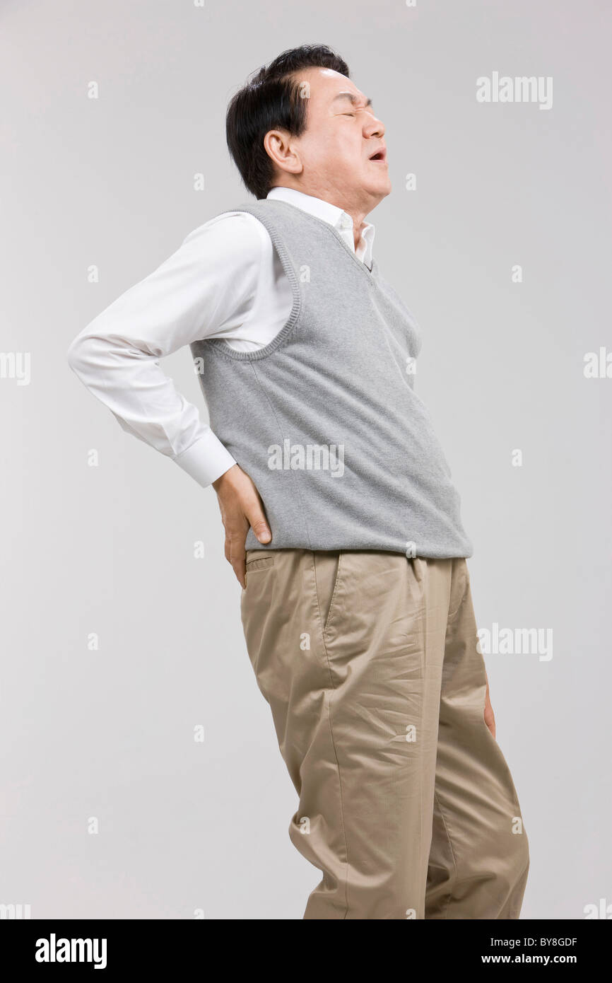 Backache hi-res stock photography and images - Alamy