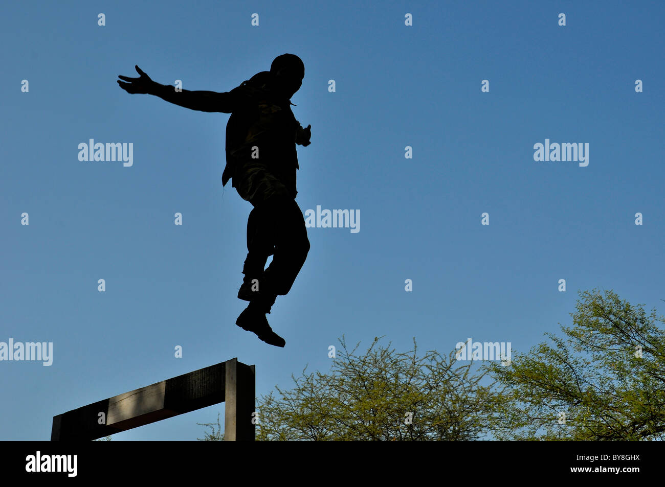 An indian Commando jumping form an obstacle Stock Photo - Alamy