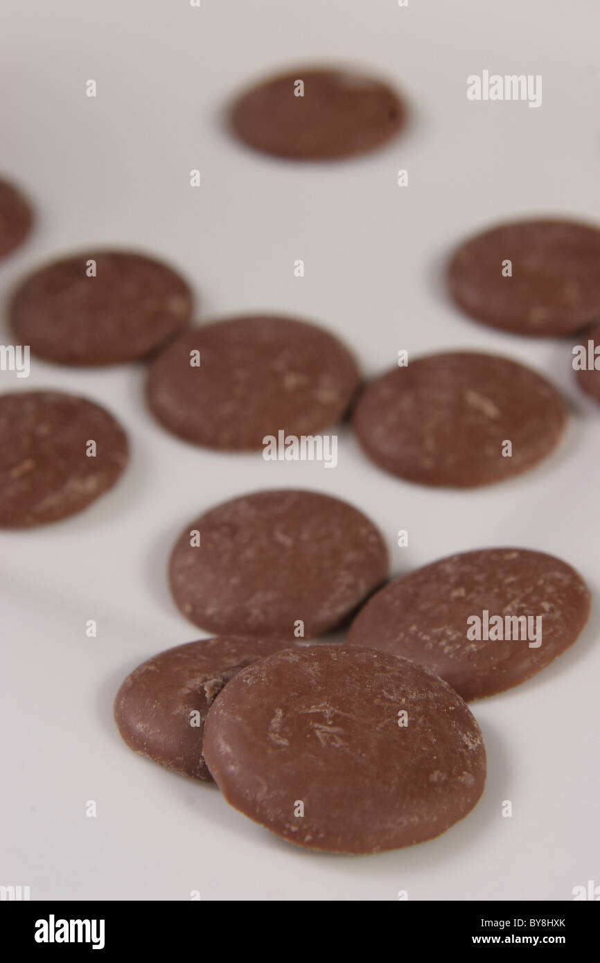 Milk chocolate button buttons hi-res stock photography and images - Alamy