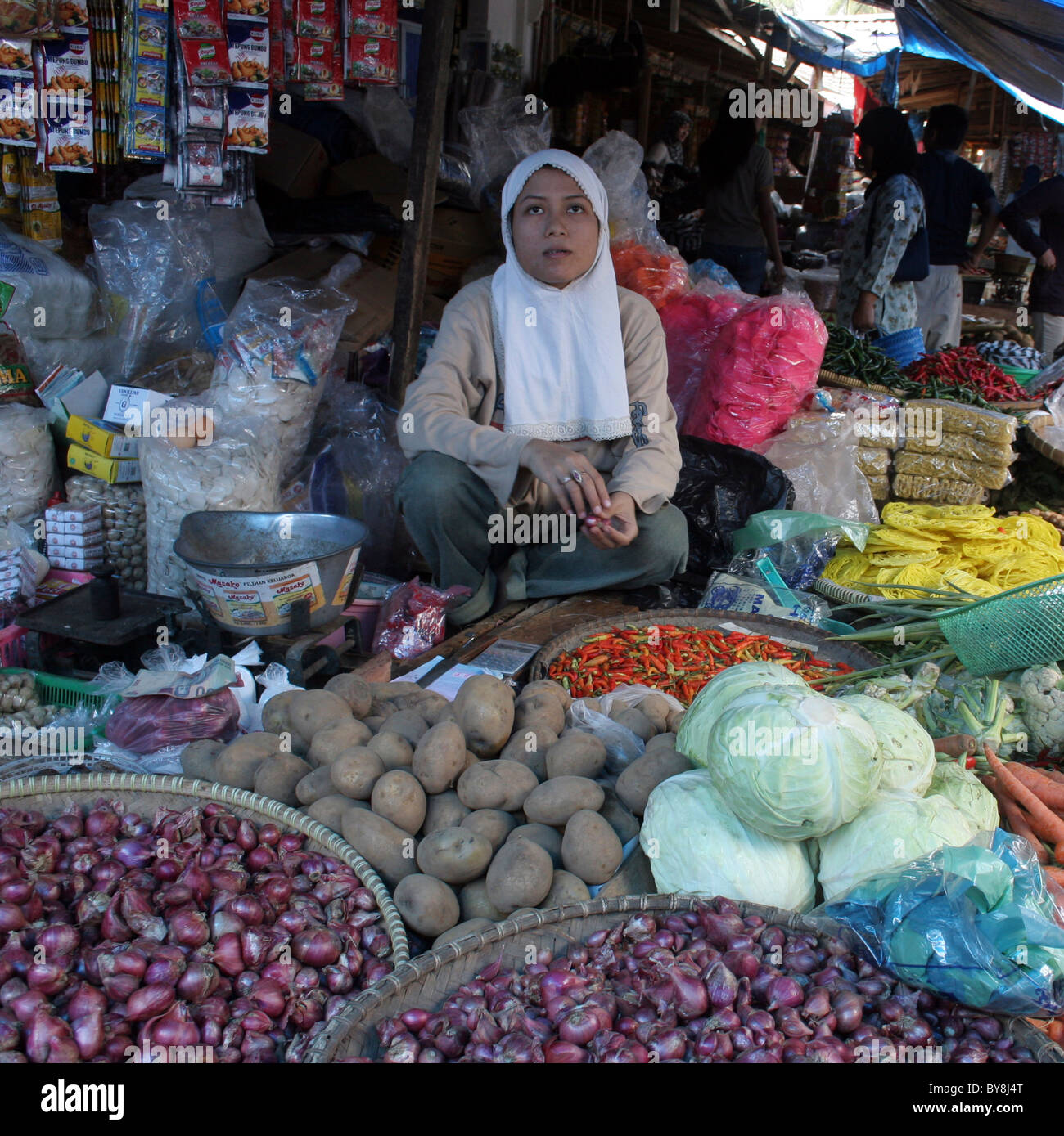 Local asian family market stall selling vegetables Stock Photo - Alamy