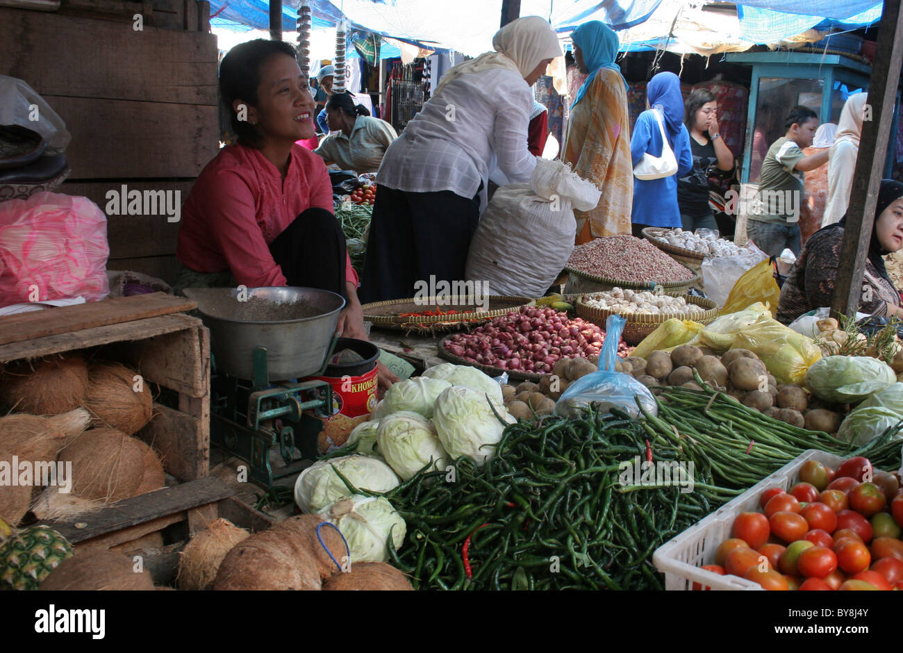 Local asian family market stall selling vegetables Stock Photo - Alamy