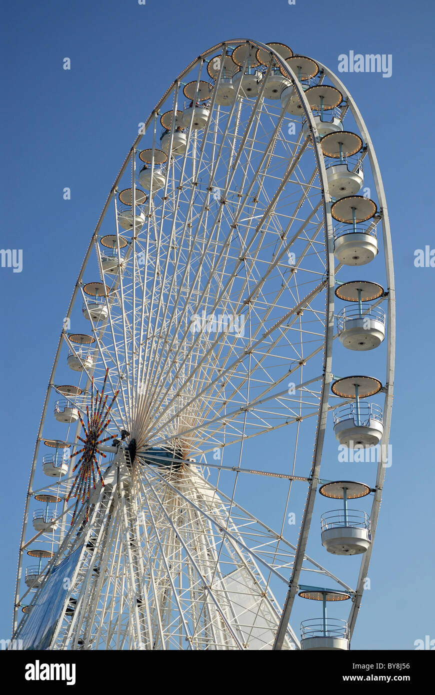 Famous big wheel or ferris wheel in Paris on blue sky background Stock ...