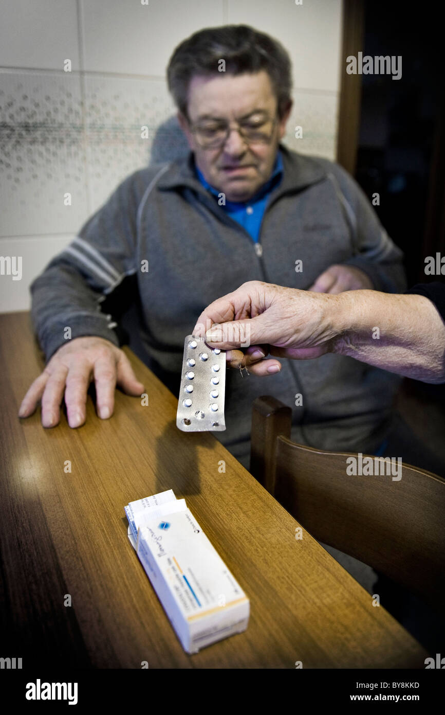 Elderly with Alzheimer's disease who tekes the pill. Cuggiono, Milan ...