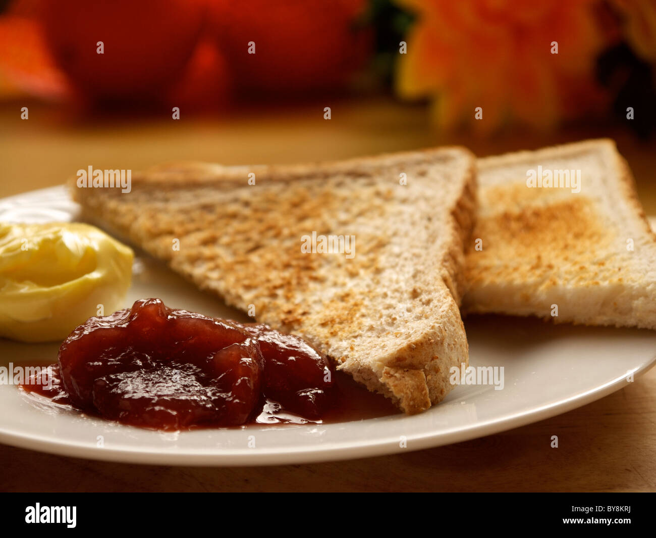 Toasted bread with jam and butter Stock Photo - Alamy