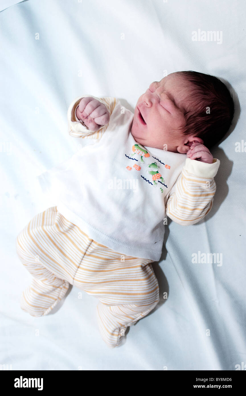 Baby crying in crib hi-res stock photography and images - Alamy