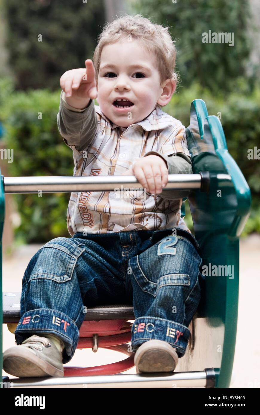 the child points the finger i laugh looking at camera Stock Photo - Alamy